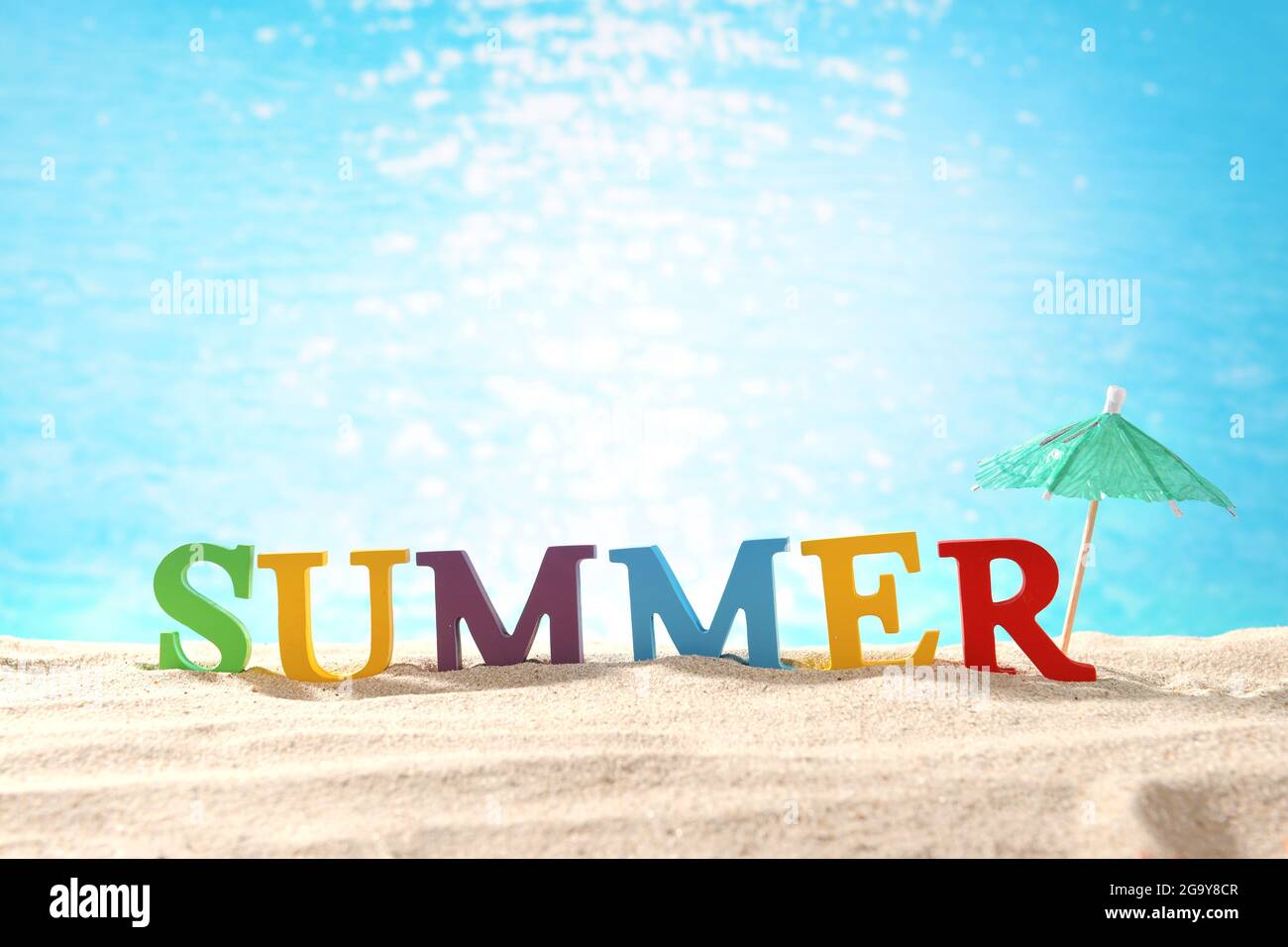 Word summer on beach sand Stock Photo - Alamy