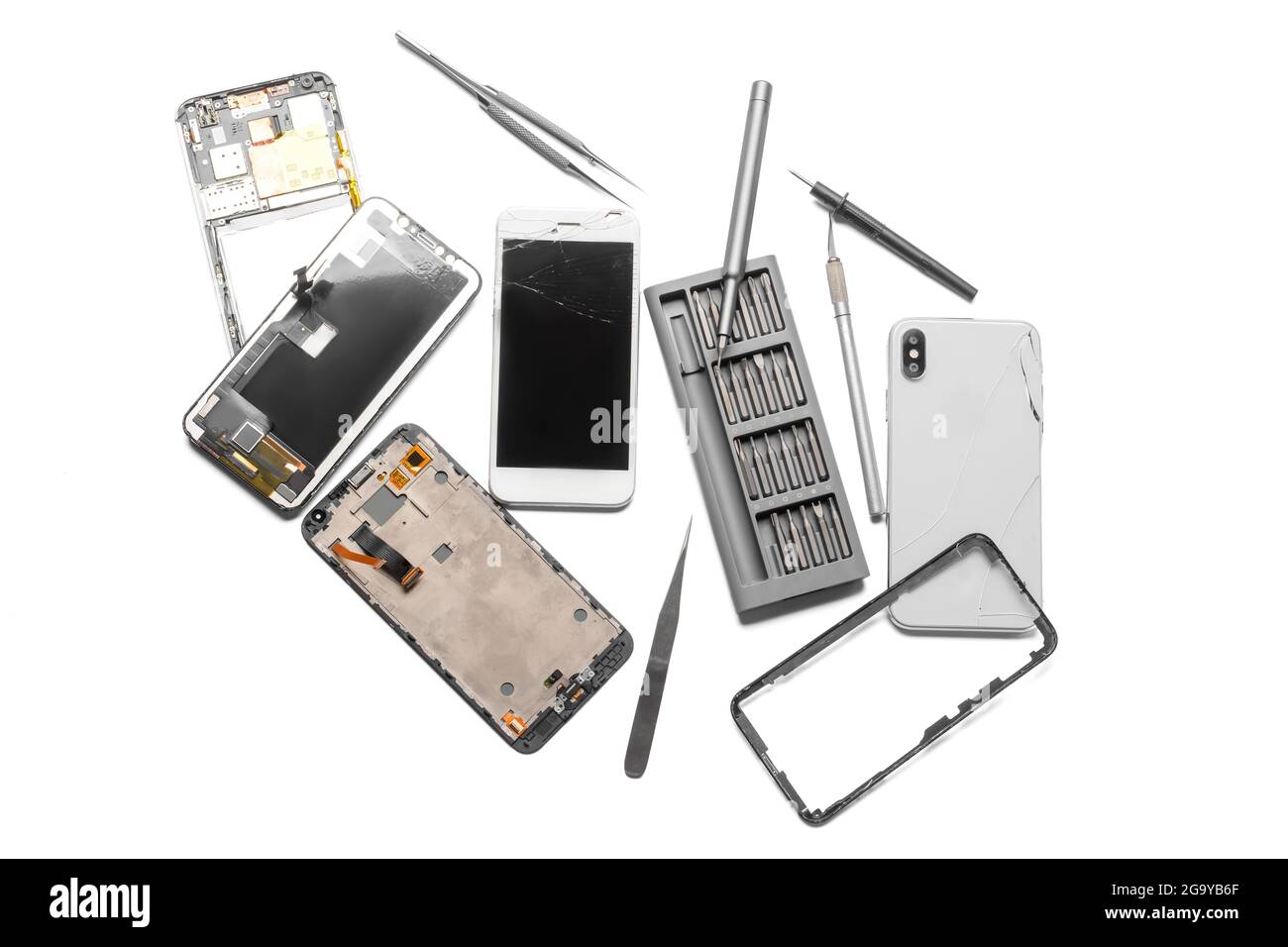 Damaged mobile phones with technician tools on white background Stock ...