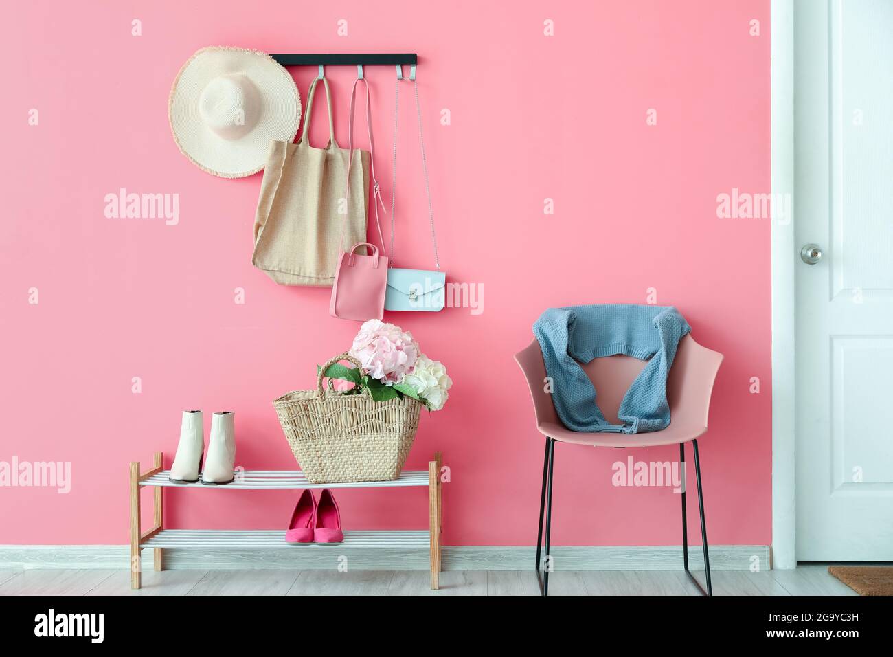 Interior of stylish hallway with hydrangea flowers Stock Photo - Alamy