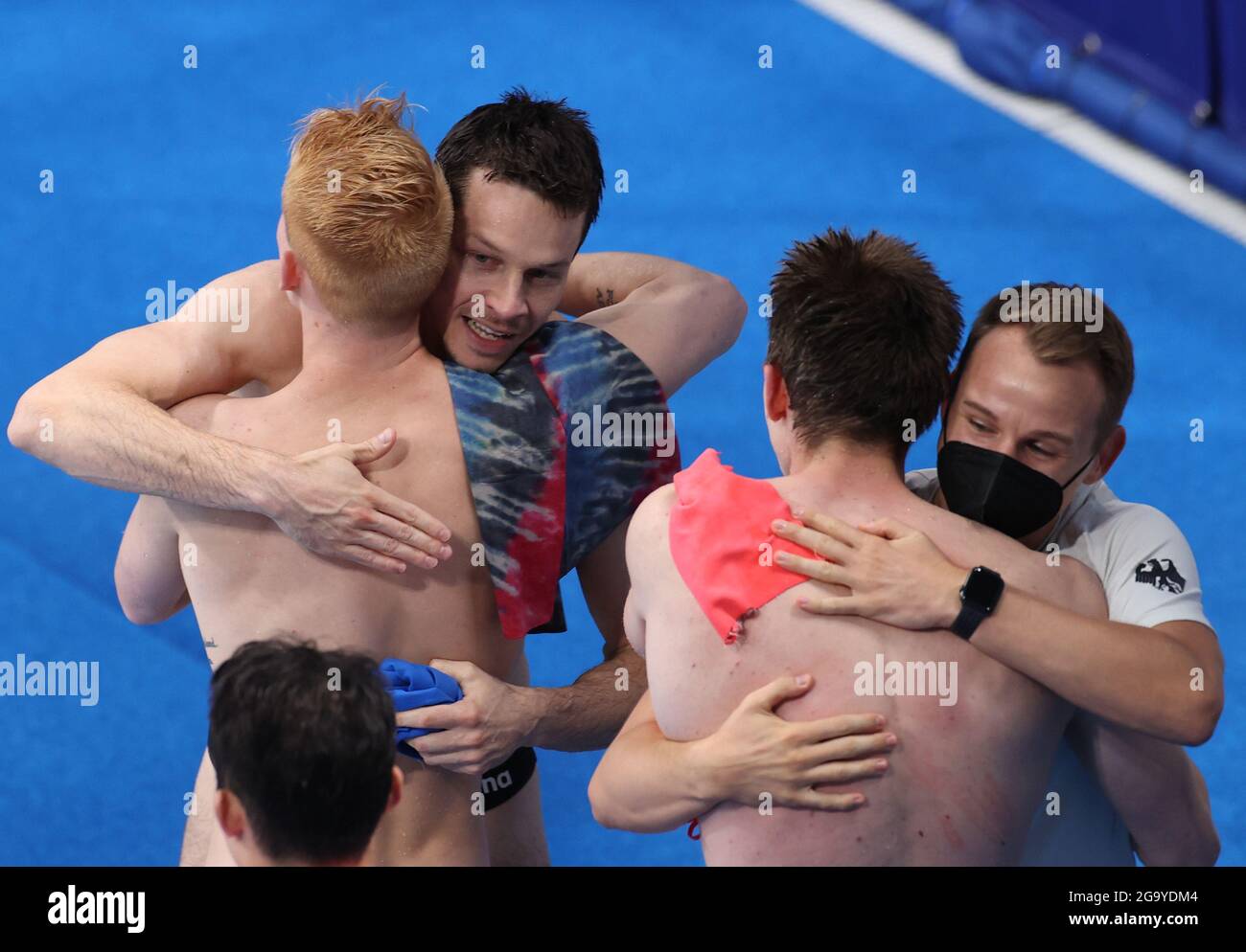 Tokyo, Japan. 28th July, 2021. Patrick Hausding (2nd L) celebrates ...