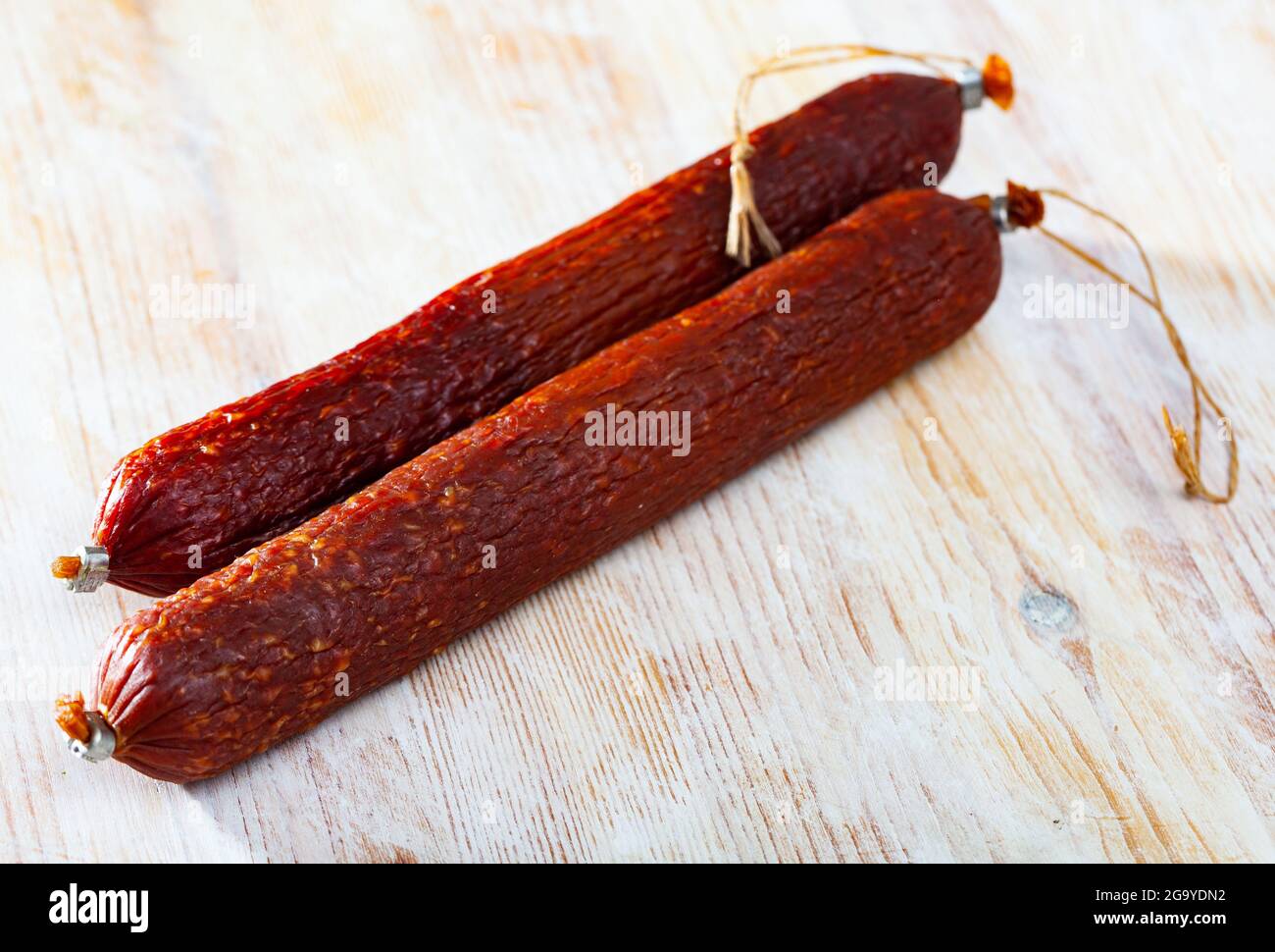 Raw smoked salami sausage Stock Photo - Alamy
