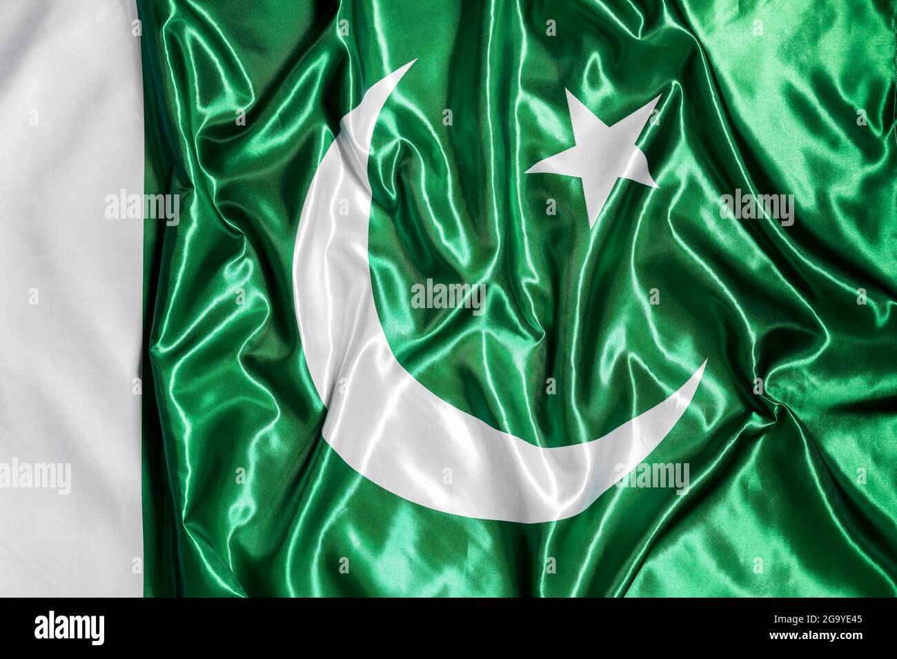 Pakistan flag as background, closeup Stock Photo - Alamy