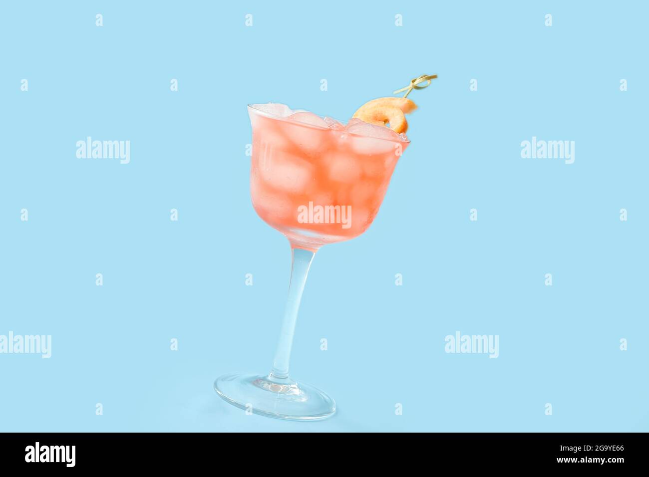 Glass of Hemingway daiquiri cocktail on color background Stock Photo ...