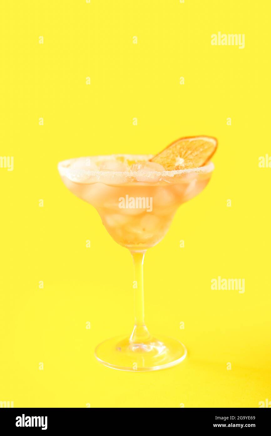 Glass of Hemingway daiquiri cocktail on color background Stock Photo ...