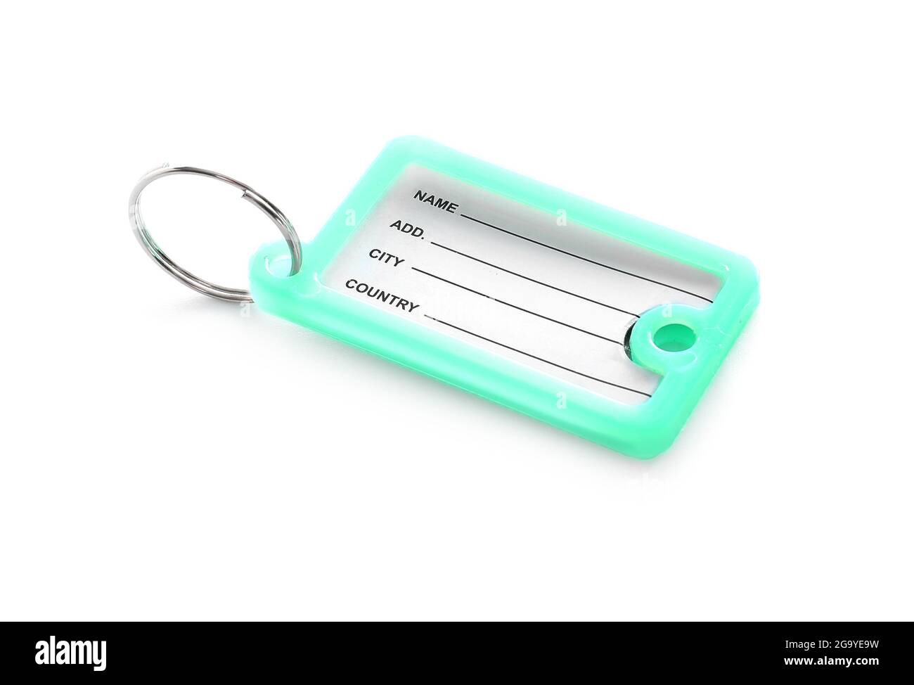 Plastic key tag on white background Stock Photo - Alamy
