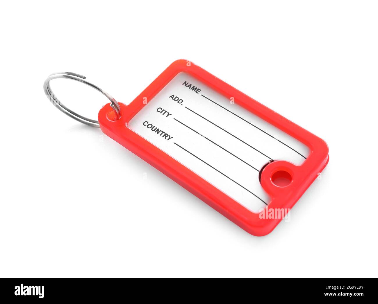 Plastic key tag on white background Stock Photo - Alamy