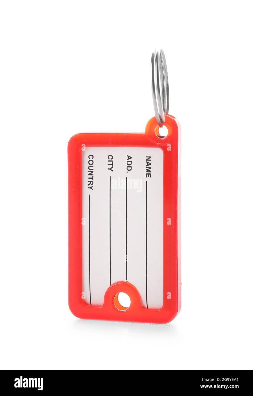 Plastic key tag on white background Stock Photo - Alamy