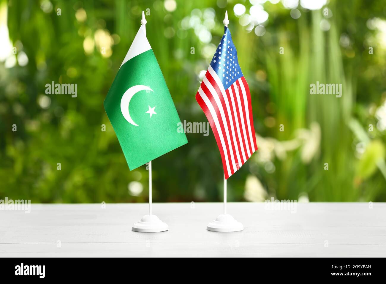 Flags of USA and Pakistan on table outdoors Stock Photo - Alamy
