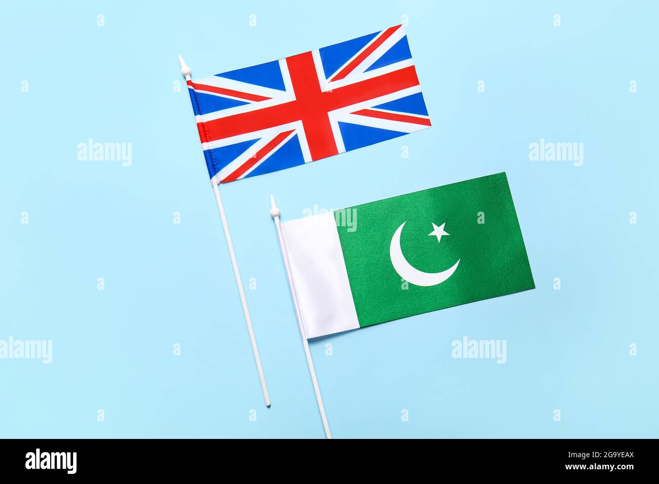 Flags of Pakistan and Great Britain on color background Stock Photo - Alamy