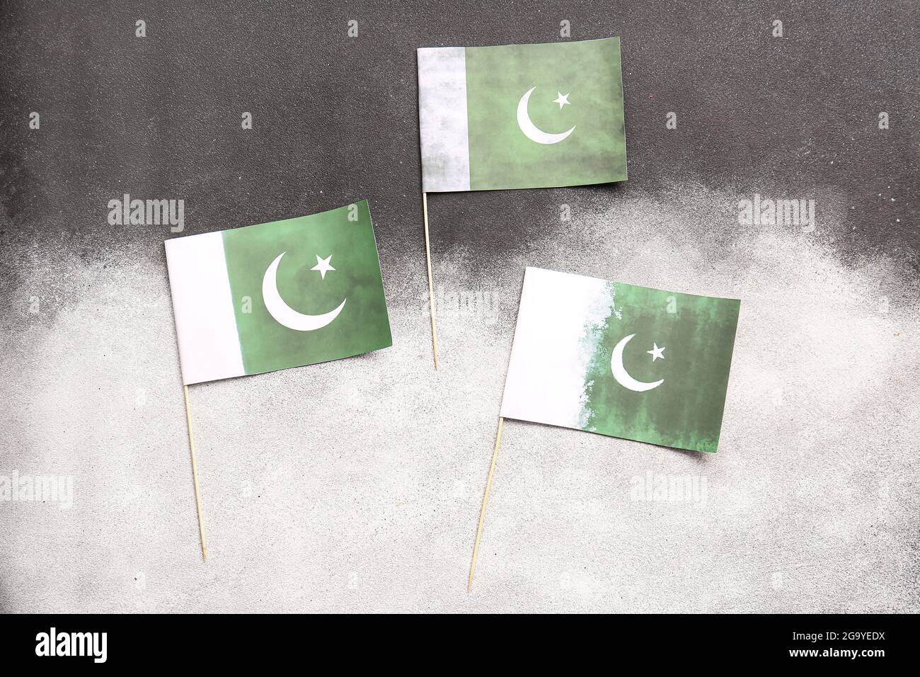 Pakistan flags on black and white background Stock Photo - Alamy