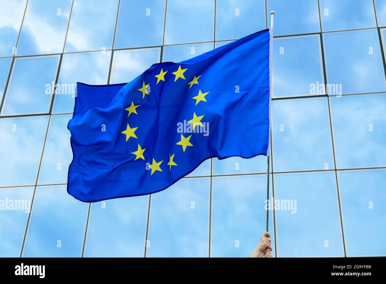 Eu flag waving person hi-res stock photography and images - Alamy