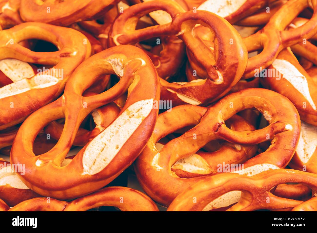 Freshly baked rustic Italian bagels at a Sunday food market in Italy ...