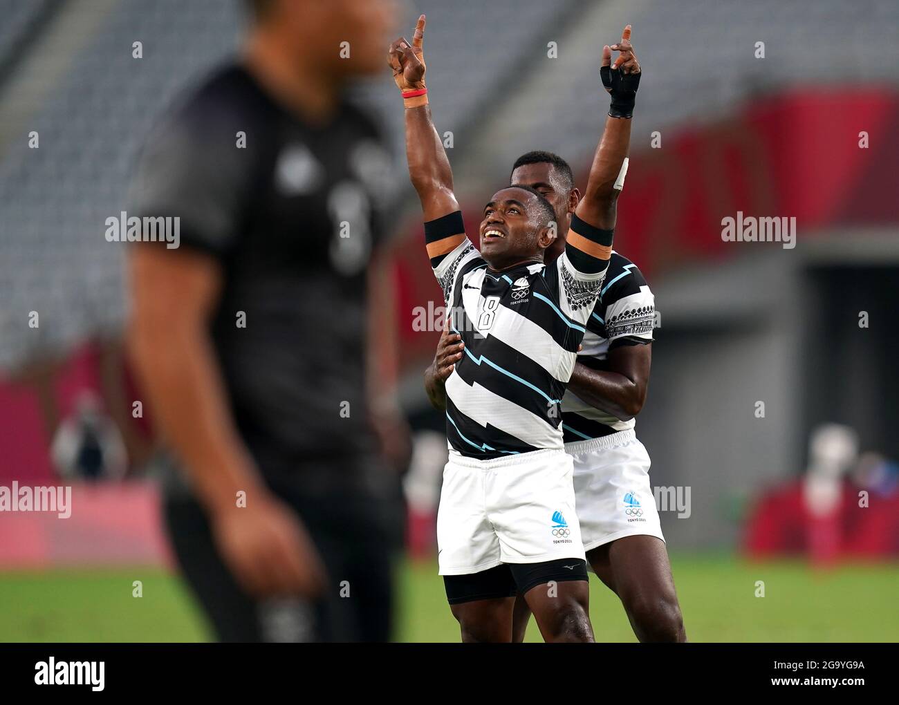 Fiji's Waisea Nacuqu celebrates victory in the Men's Rugby Seven Gold ...