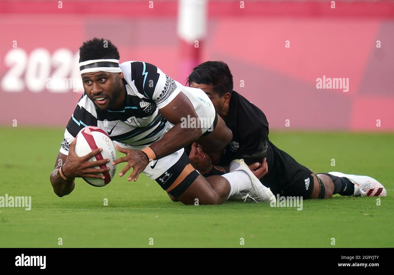 Fiji's Vilimoni Botitu is tackled during the Men's Rugby Seven Gold ...