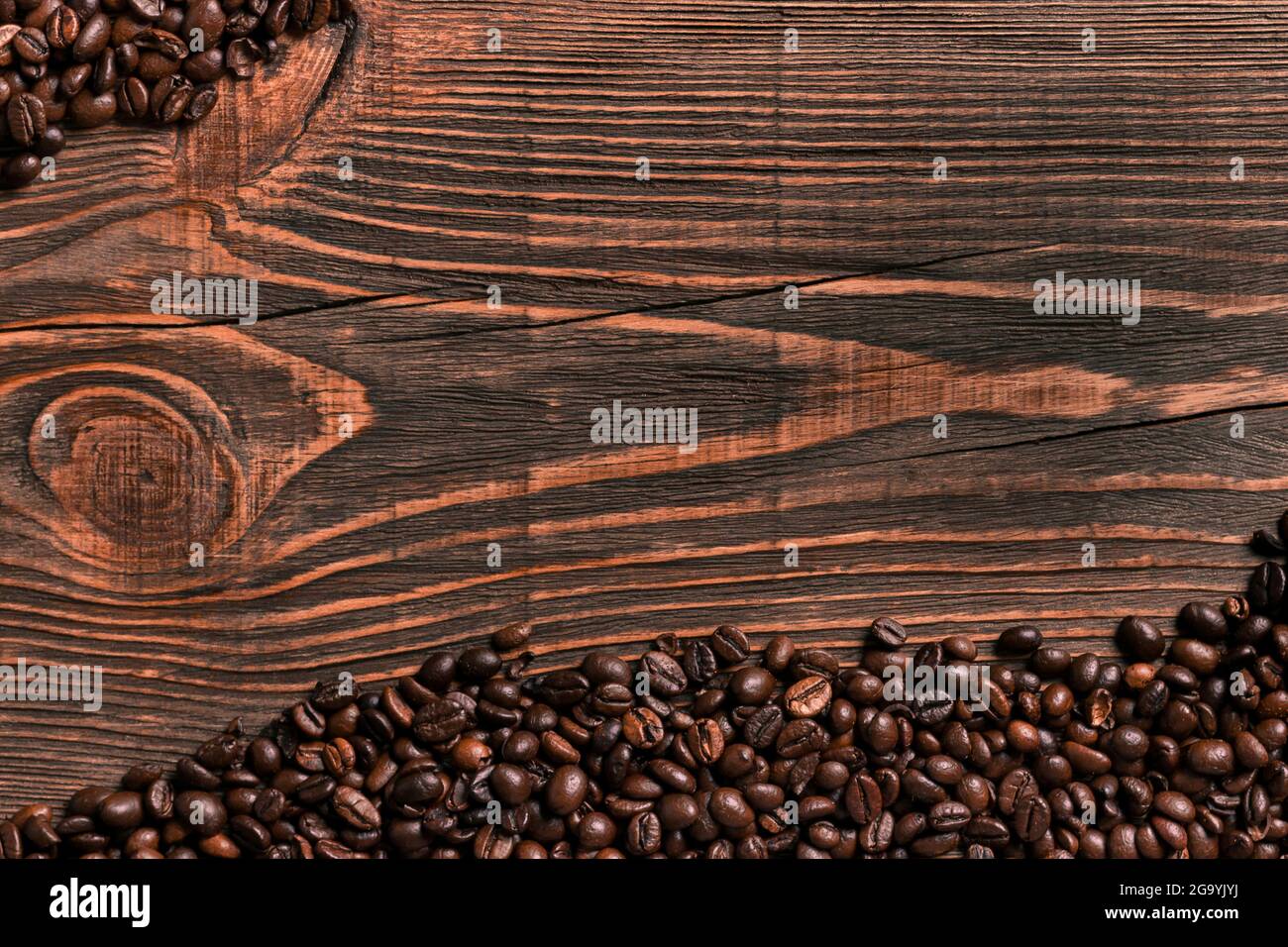 Coffee beans on wooden table texture with copy space. View from Stock ...