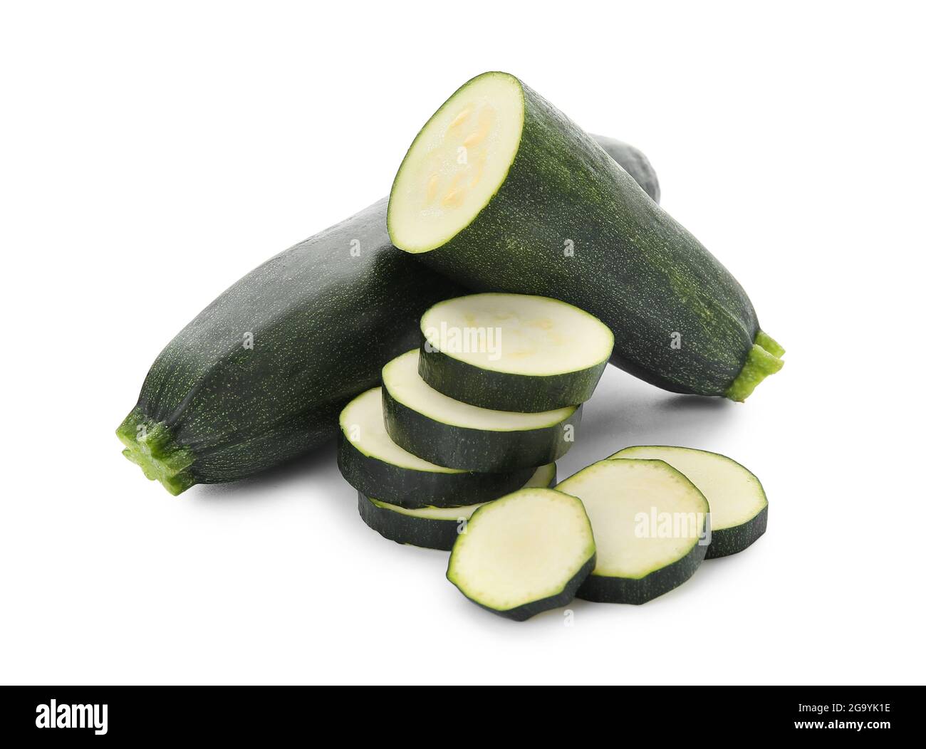 Fresh zucchini squash and slices on white background Stock Photo - Alamy