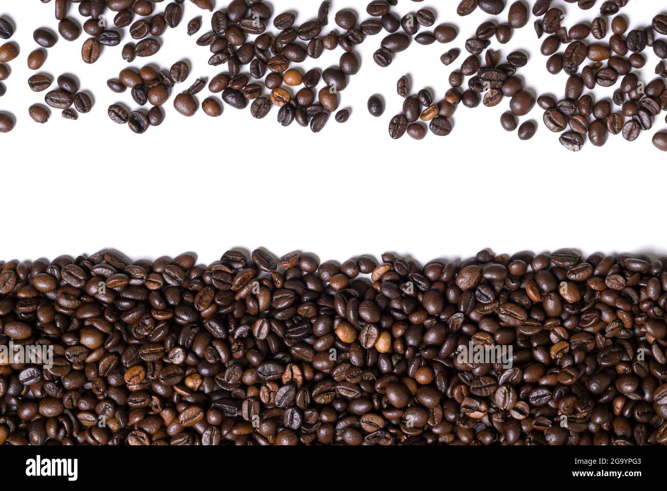 White background with coffee beans on the side Stock Photo - Alamy