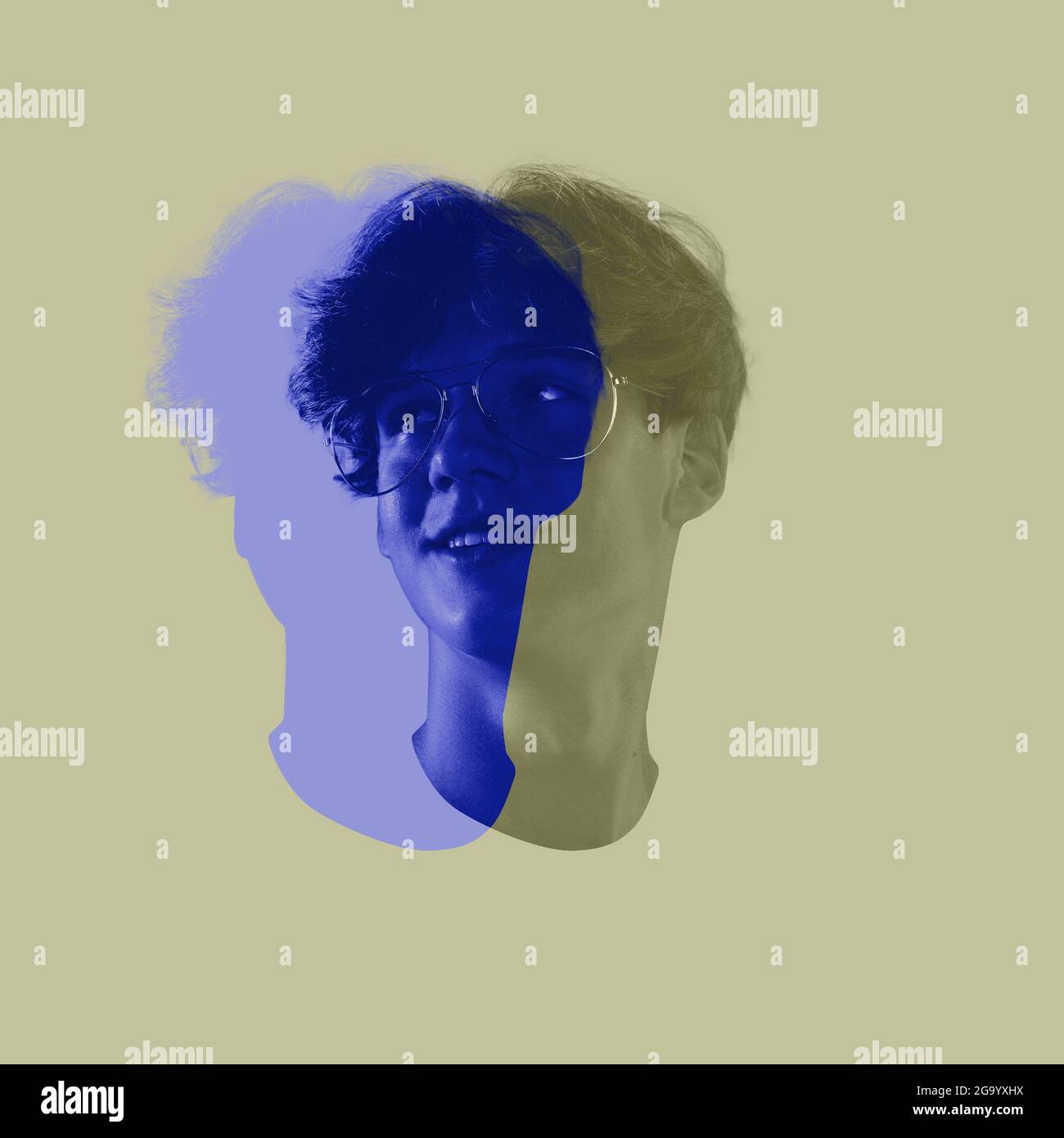 Close-up young man's face, head with colored silhouette, shadow ...