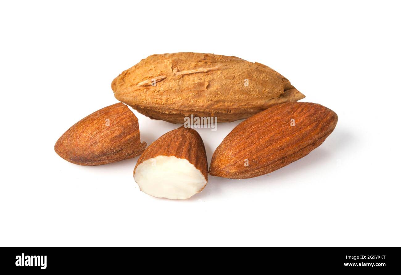 Heap of almond nuts in shell isolated on white with clipping path Stock ...