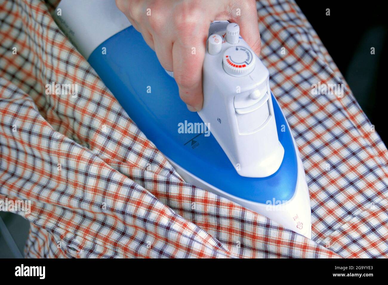 a shirt is ironed Stock Photo - Alamy