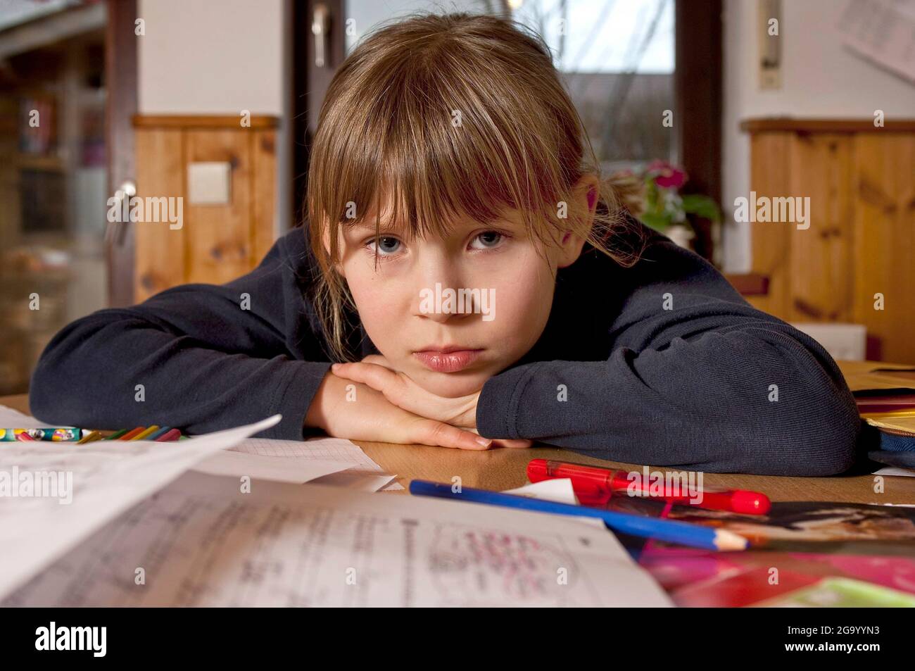 girl doesn't feel like doing homework , Germany Stock Photo - Alamy