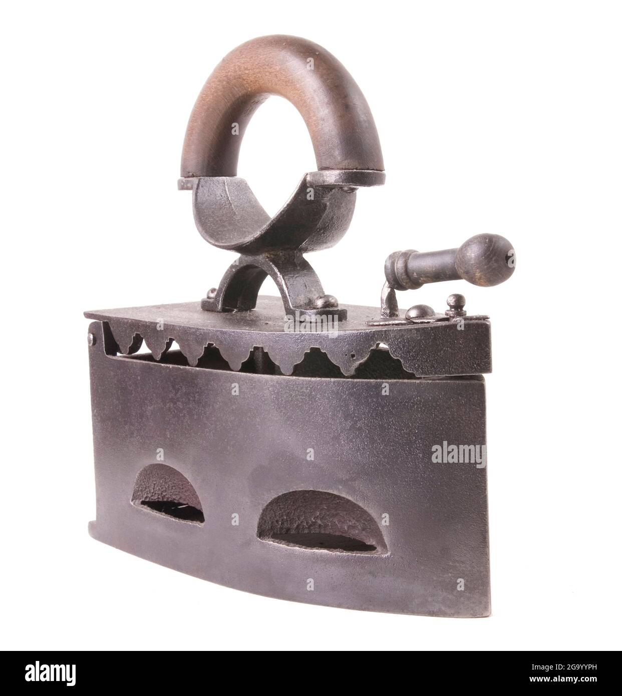 old cast-iron iron, cut out Stock Photo - Alamy