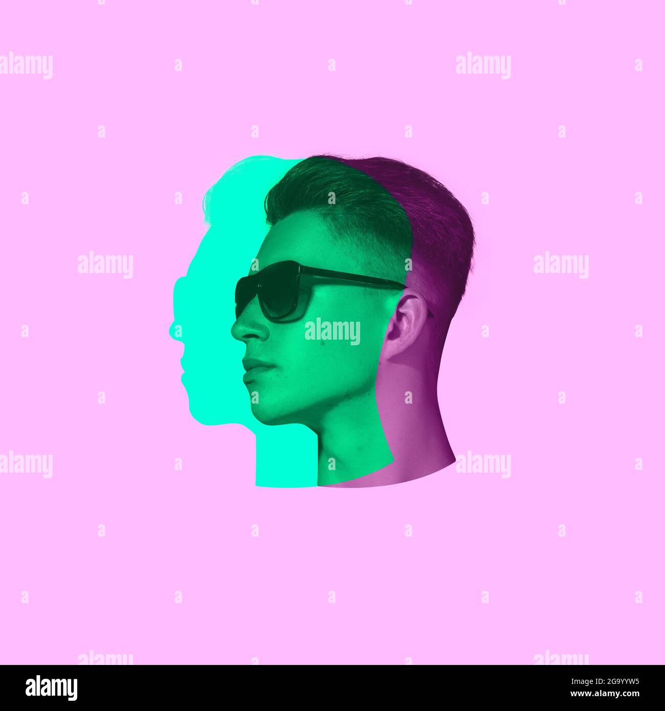 Close-up young man's face, head with colored silhouette, shadow ...