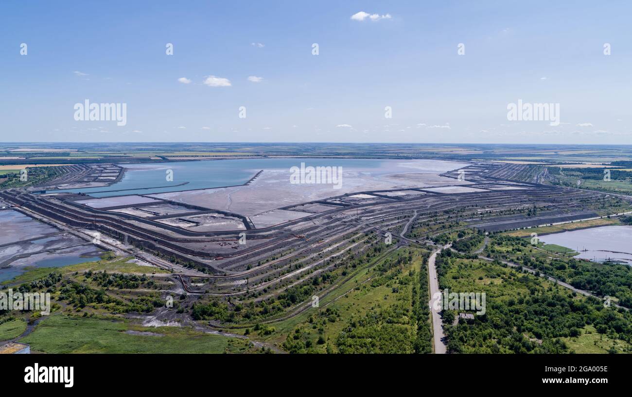 Tailing dump in industrial city aerial view Stock Photo - Alamy