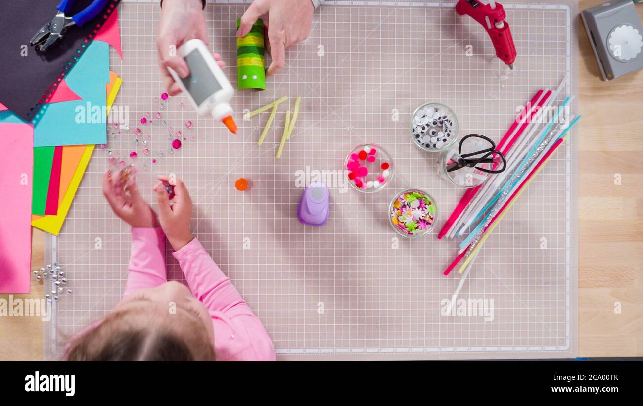 Flat lay. Kids papercraft. Making paper bugs out of the empty toilet ...