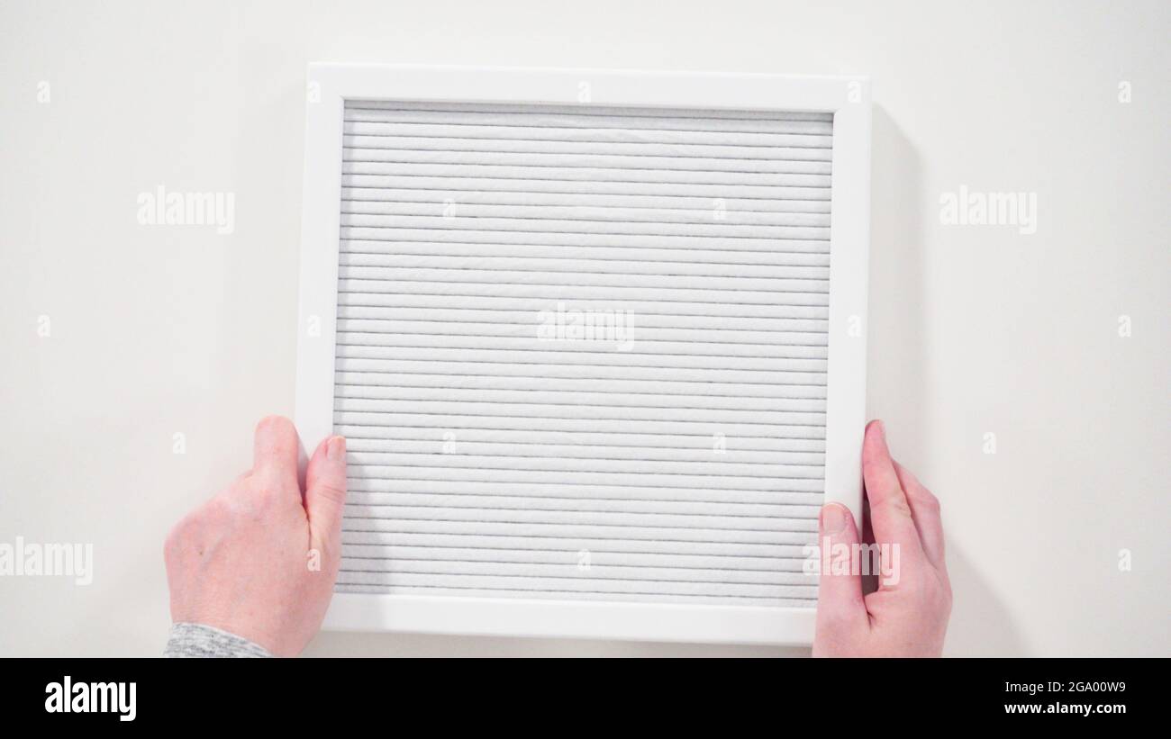 Flat lay. STAY HOME and STAY SAFE sign on a white message board Stock ...