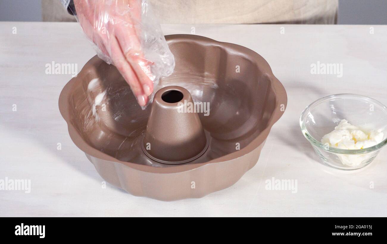 Step by step. Greased metal bundt cake pan to bake chocolate bundt cake ...