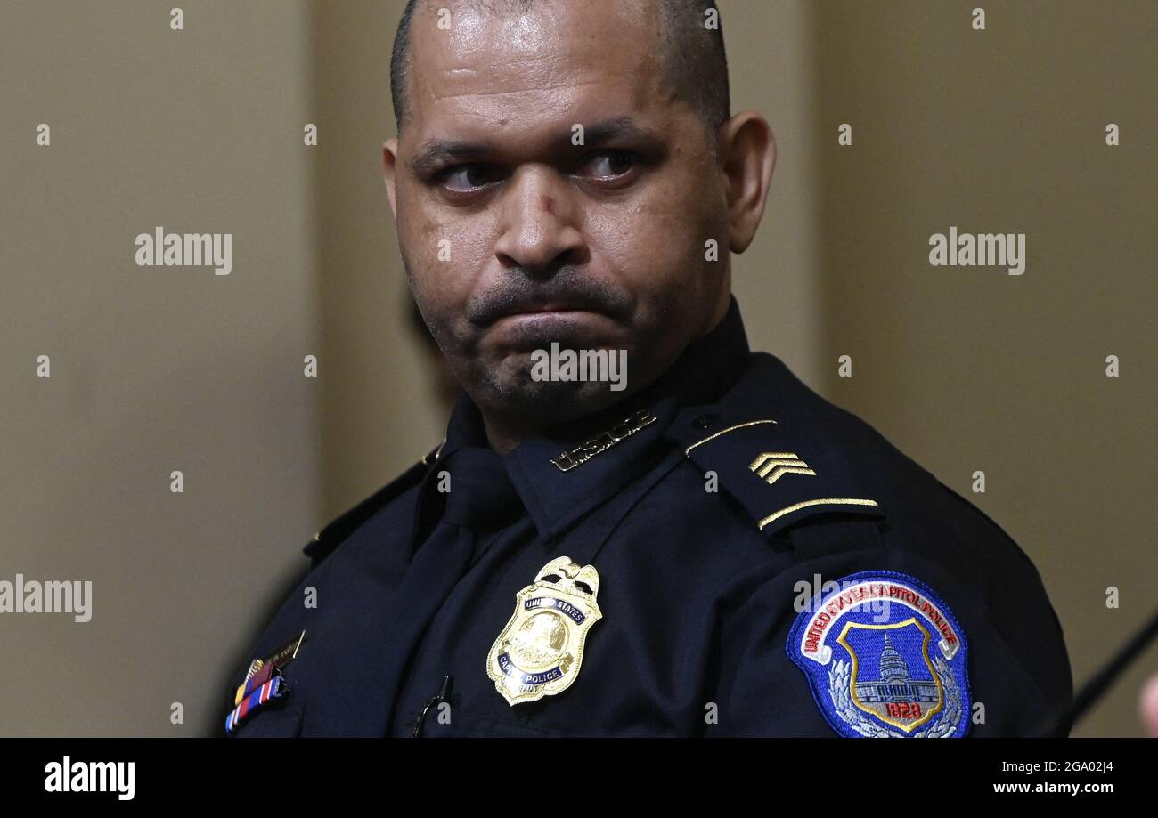 US Capitol Police officer Sgt. Aquilino Gonell reacts during a hearing ...