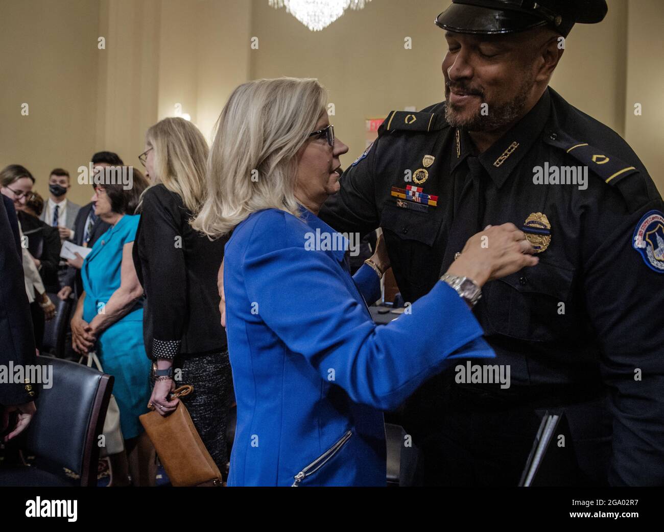 WASHINGTON, DC - JULY 27: Rep. Liz Cheney(R-WY) embraces officer Harry ...