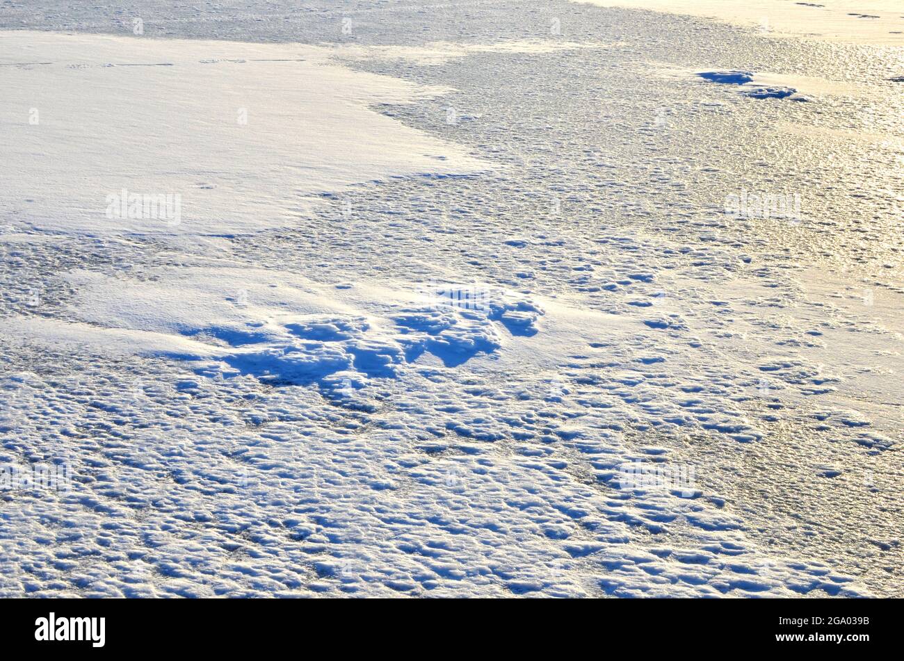 Structure of snow and ice on frozen lake. Winter landscape concept ...