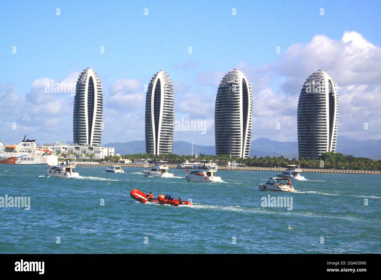 Hainan, China, 27 July 2021. Hundreds of yachts and boats sailed out to ...