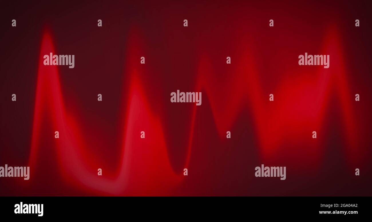 Digital animation of red heart rate monitor waves on black background ...