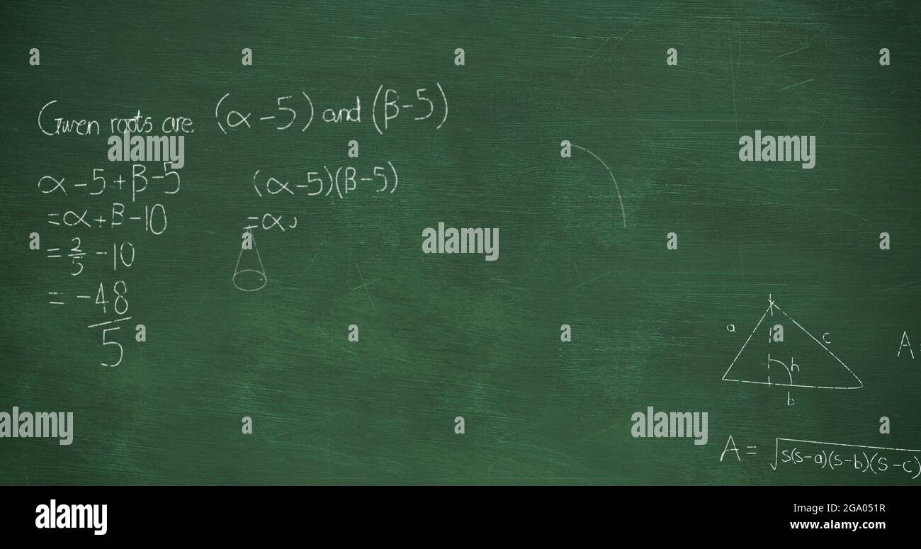 Mathmatical equations written in chalk rising from green chalkboard ...