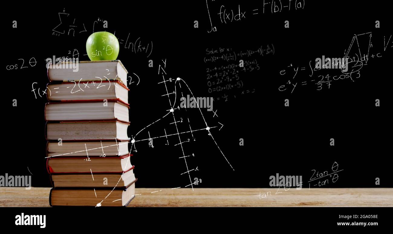 Mathematical equations floating against apple on stack of books Stock ...