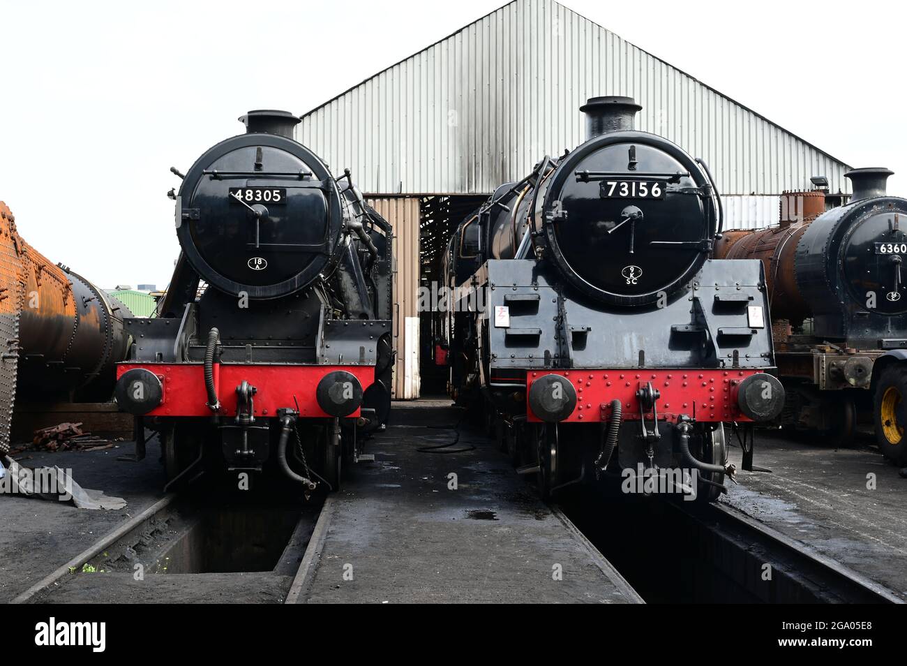 Two black steam locomotives in a railway siding Stock Photo - Alamy