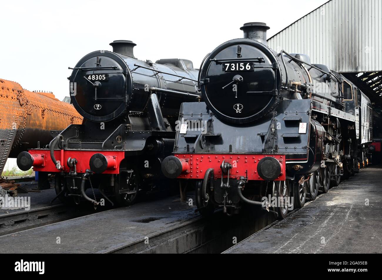 Two black steam locomotives in a railway siding Stock Photo - Alamy
