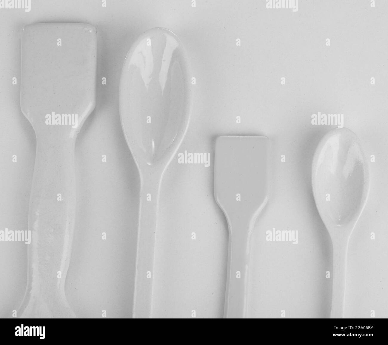 Laboratory spatulas isolated on white Stock Photo - Alamy