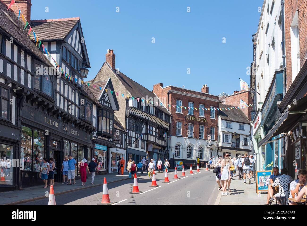 Shops and shoppers in Wyle Cop in the centre of Shrewsbury, Shropshire ...