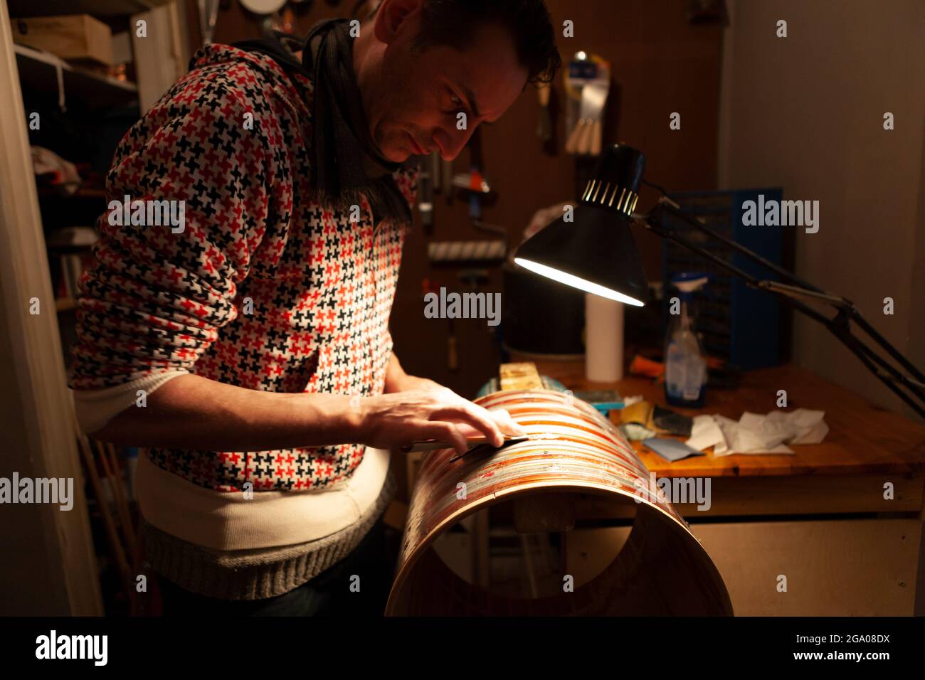 drum maker at work - musician creating drum Stock Photo - Alamy