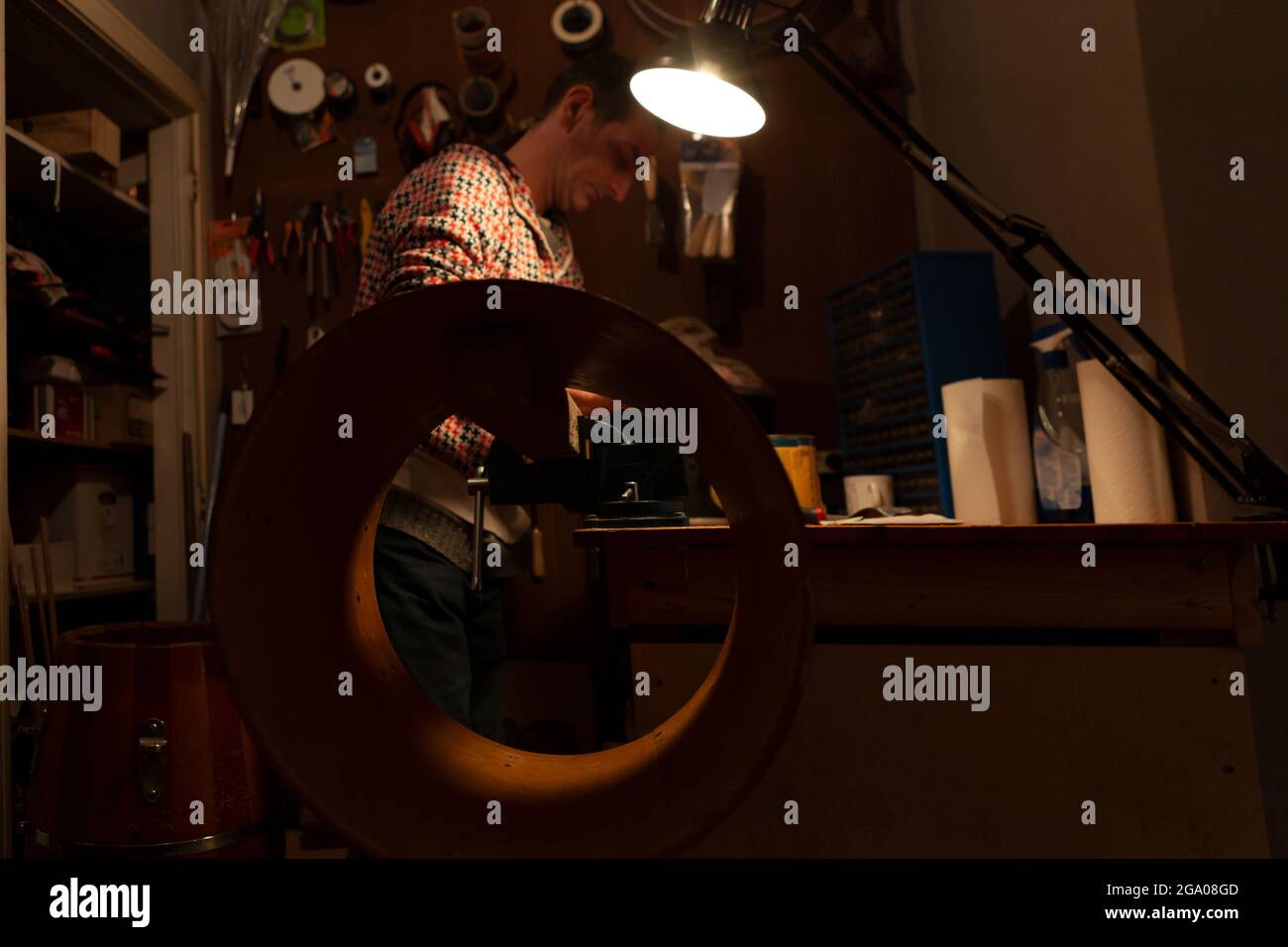 drum maker at work - musician creating drum Stock Photo - Alamy