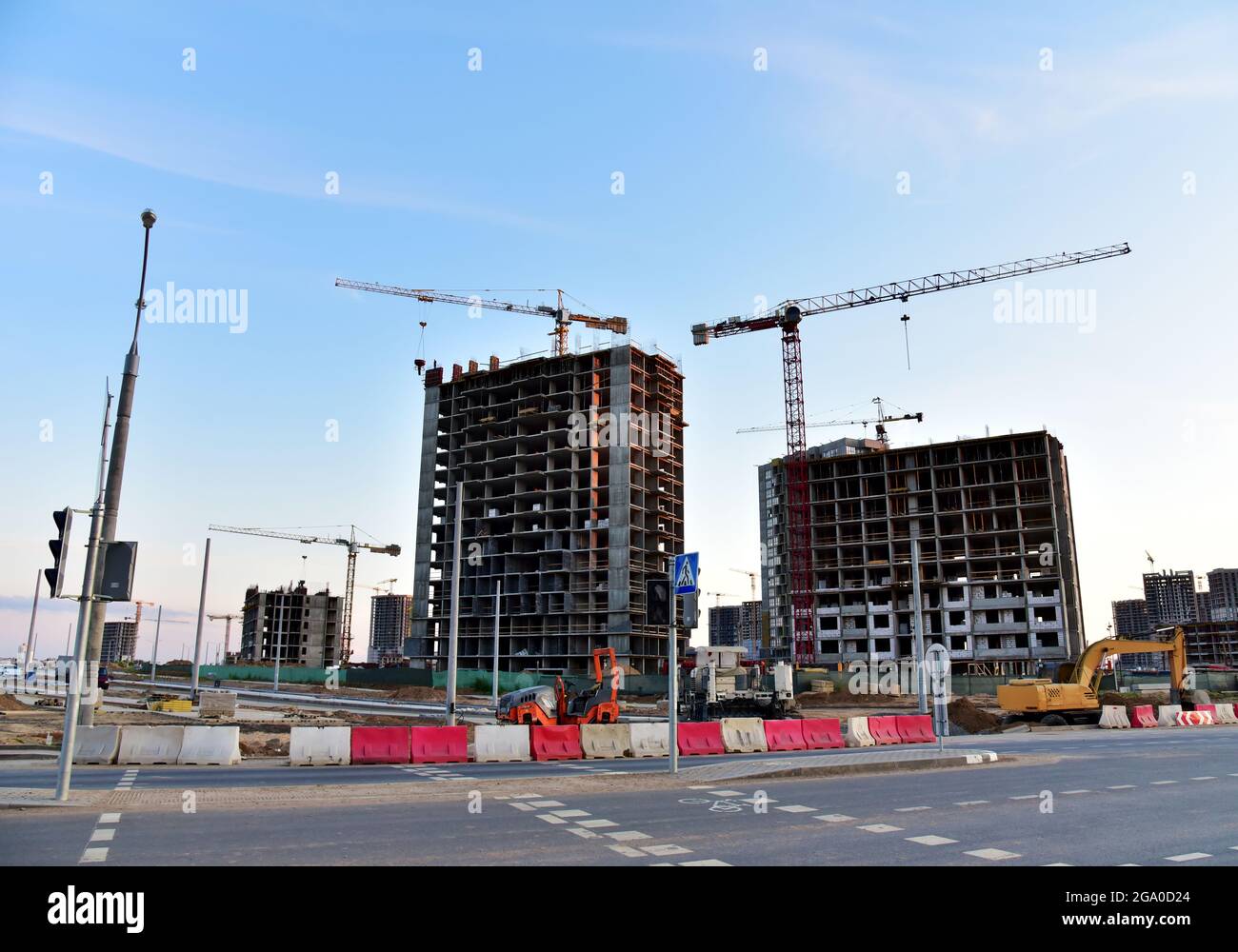 View on the large construction site with tower cranes and buildings on ...