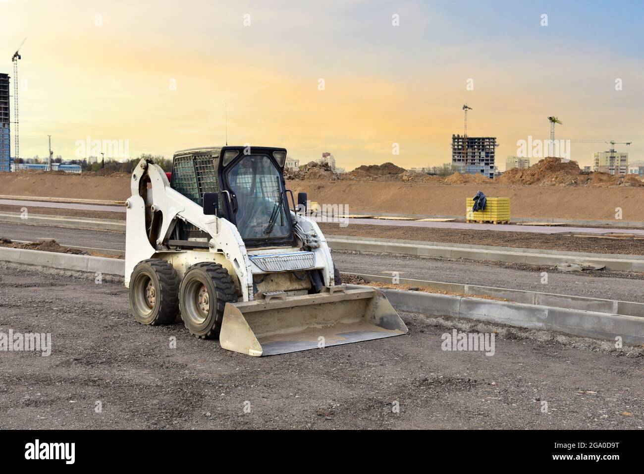 Skid-steer loader for loading and unloading works on city streets ...