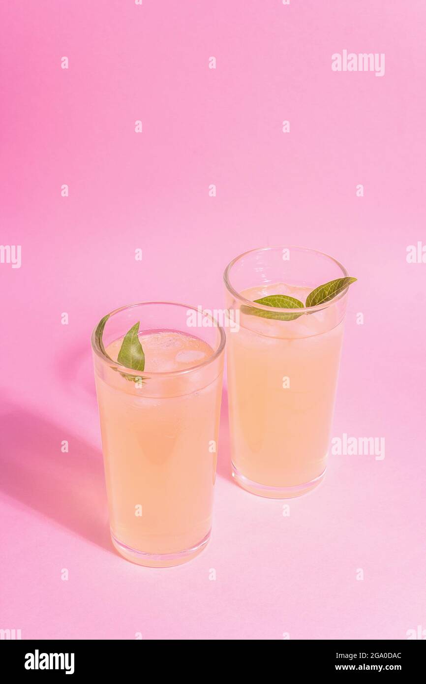 Summer refreshing cocktail. Cold sweet drink, modern hard light, dark ...