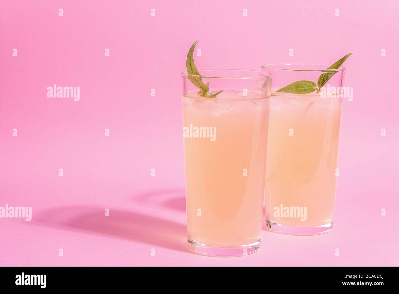 Summer refreshing cocktail. Cold sweet drink, modern hard light, dark ...