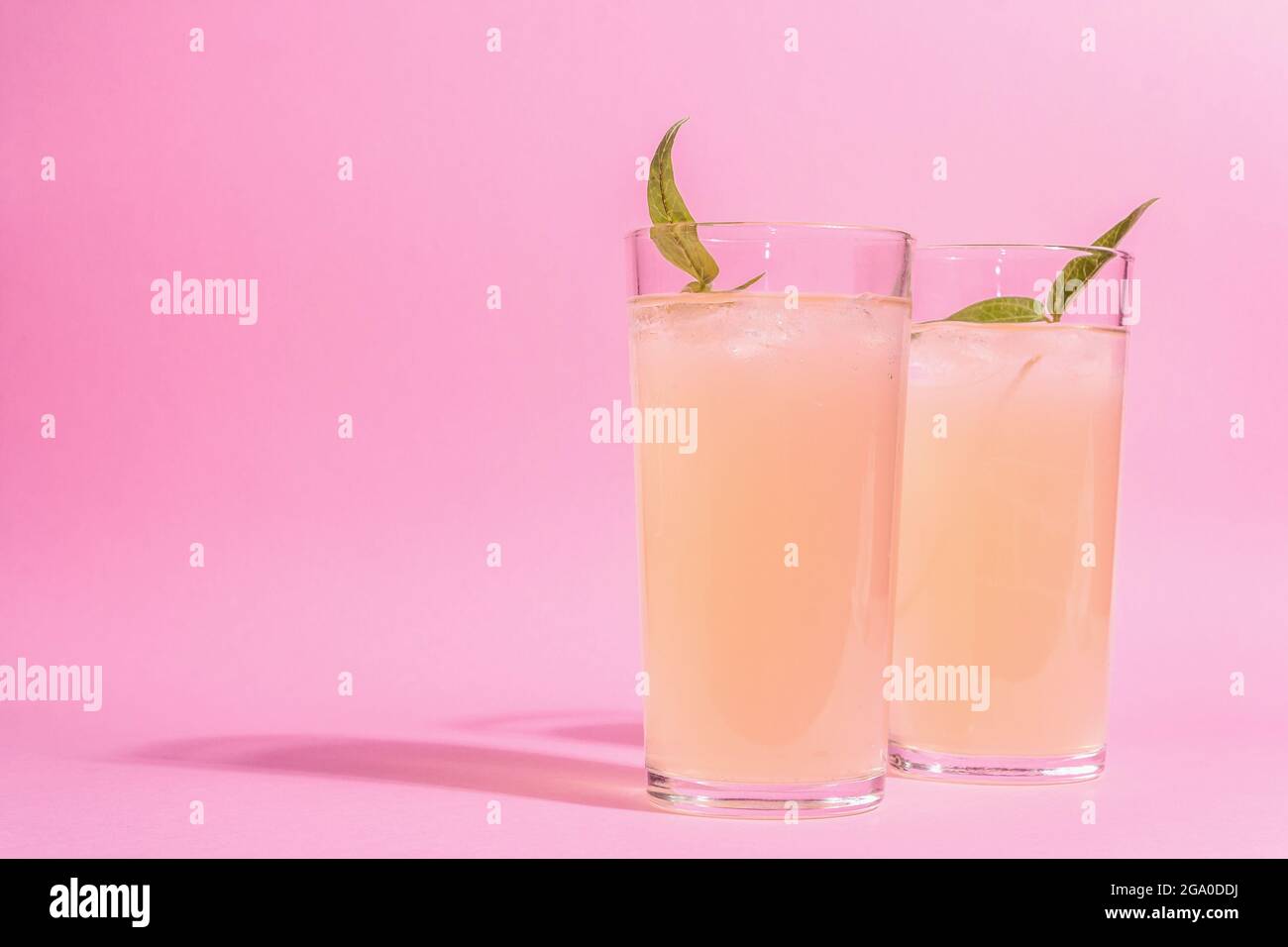 Summer refreshing cocktail. Cold sweet drink, modern hard light, dark ...