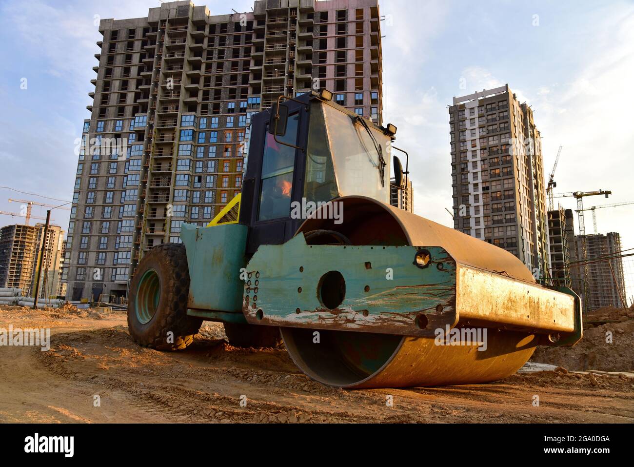 Vibro Roller Soil Compactor Leveling Ground At Construction Site